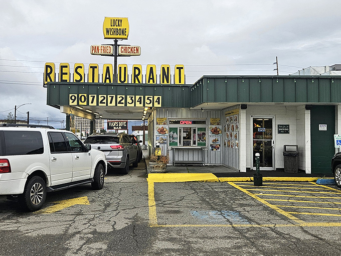 Where culinary magic happens behind an unassuming facade. This vintage exterior might not win architectural awards, but the chicken inside deserves a gold medal.