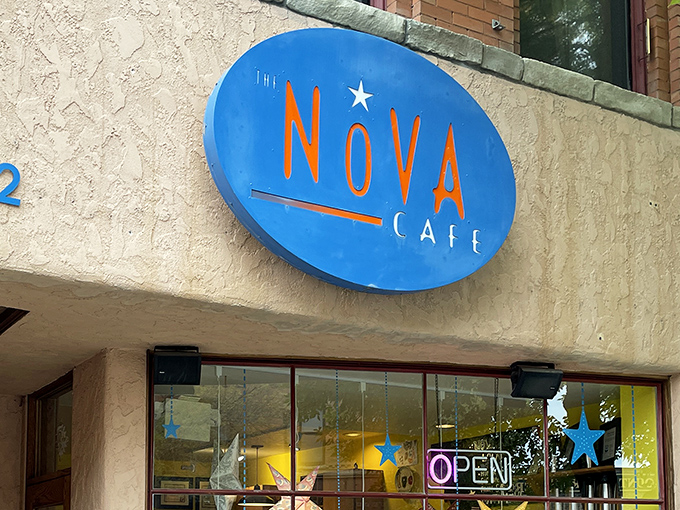 That blue oval sign isn't just a logo&mdash;it's a promise of breakfast nirvana waiting just beyond those star-decorated windows.