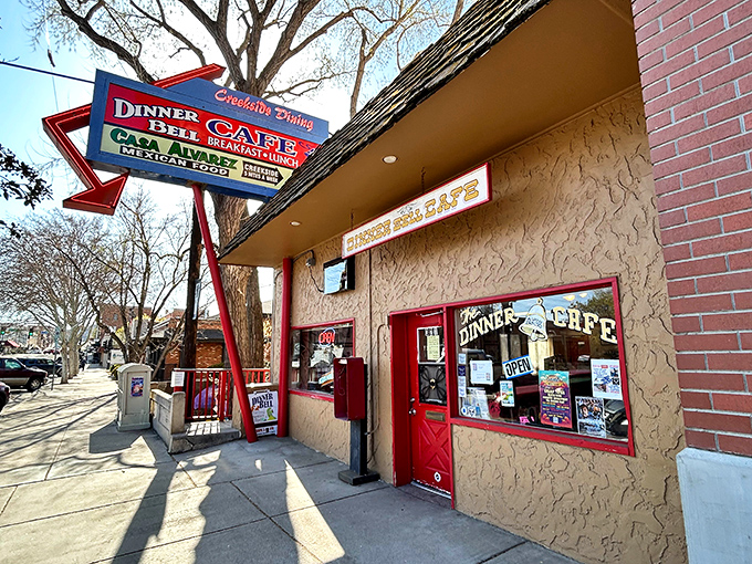 That iconic red door and vintage sign aren't just restaurant decor&mdash;they're a beacon of breakfast hope for cinnamon roll pilgrims across Arizona.