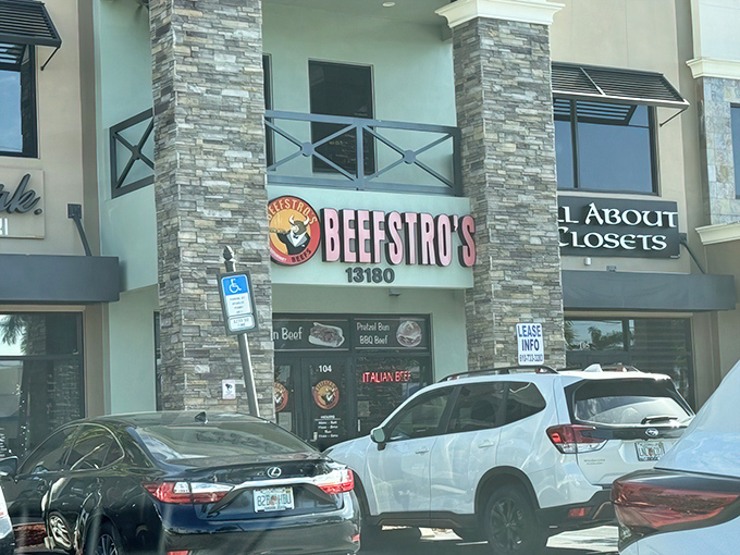 The storefront beckons like a Chicago mirage in the Florida sunshine, promising authentic Windy City flavors behind that distinctive bull logo.