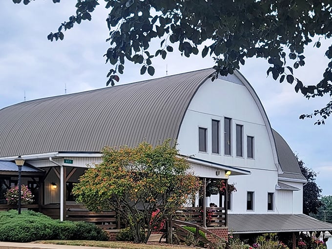 The iconic curved roof of The Barn Restaurant stands proudly against the Ohio sky, promising comfort food that'll make your cardiologist wince and your soul sing.