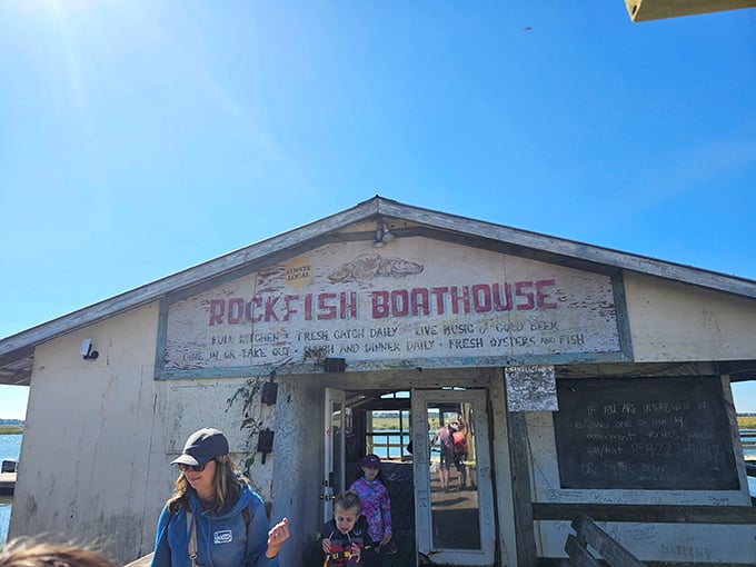 The weathered sign says "Rock Fish Boathouse," but locals know this humble shack houses seafood treasures that would make Neptune himself jealous.