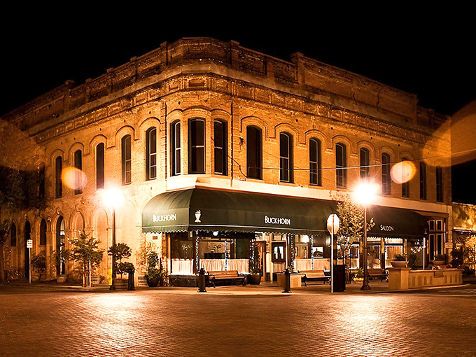 The historic brick facade of Buckhorn Steakhouse glows at night, promising carnivorous delights within this Winters landmark that&rsquo;s been drawing meat lovers for generations.