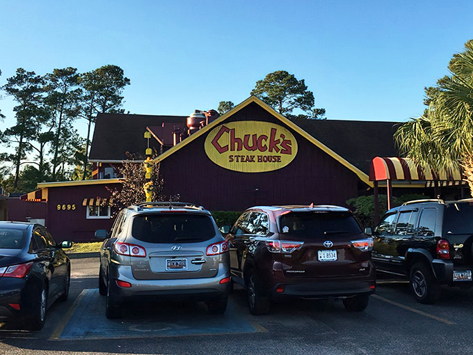 That distinctive brown building with yellow trim practically winks at you from the road, promising beef bliss inside.