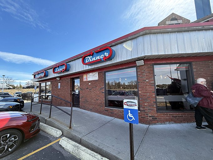 The red-trimmed exterior of Roundabout Diner beckons like a beacon of breakfast hope. This Portsmouth landmark promises comfort food that's anything but ordinary.