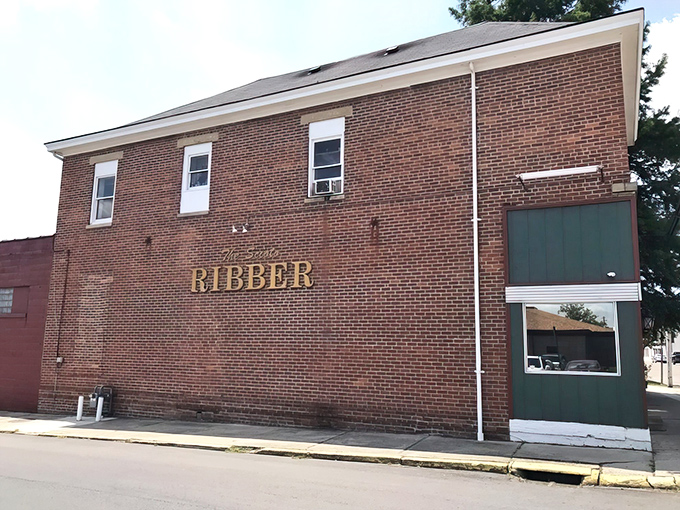 The unassuming brick exterior of Scioto Ribber stands like a meat lover's Fortress of Solitude in Portsmouth. Gold lettering promises treasures within.