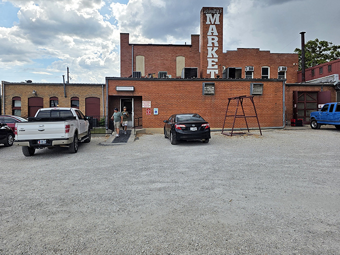 The brick fortress of flavor stands unassuming in Lockhart, its "MARKET" sign a humble declaration that inside, meat magic happens daily.