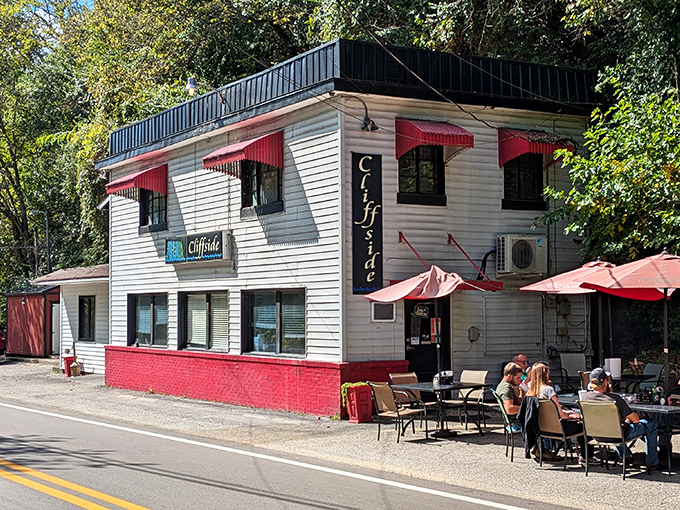 The classic white clapboard exterior with red awnings isn't trying to impress anyone&mdash;until you taste what's cooking inside this Frankfort institution.