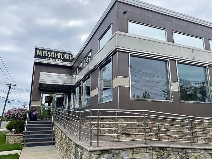 Stone foundation meets contemporary design in this architectural handshake. The Massapequa Diner stands ready to welcome you, rain or shine.