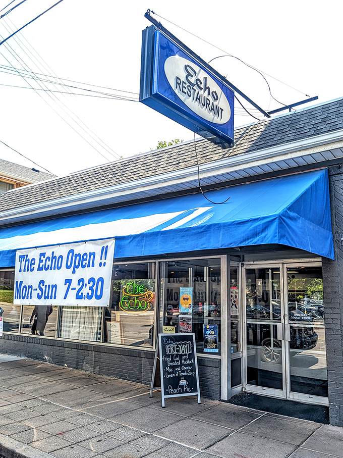 The iconic blue and white awning of The Echo beckons hungry Cincinnatians like a breakfast lighthouse in Hyde Park.