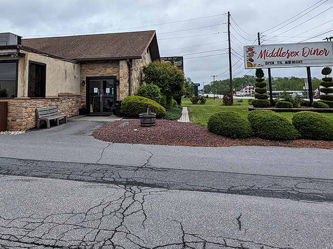 The stone facade of Middlesex Diner stands like a culinary fortress on Harrisburg Pike, promising comfort food treasures within its unassuming walls.