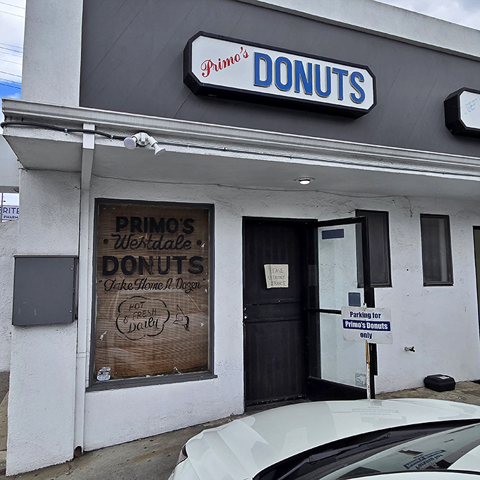 The unassuming storefront of Primo's Donuts stands as a beacon of sweet simplicity on Sawtelle Boulevard, promising delicious treasures within its humble walls.