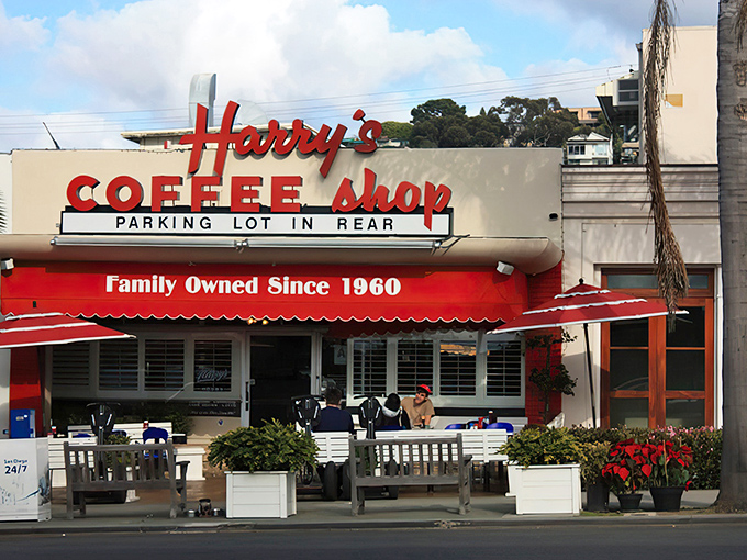 The iconic red signage of Harry's Coffee Shop stands as a beacon of breakfast hope in La Jolla, promising comfort food that's stood the test of time.
