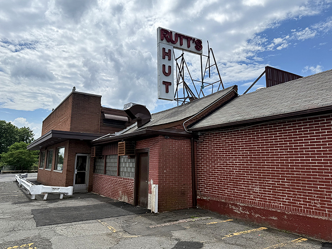 That vintage neon sign has been guiding hungry pilgrims to hot dog nirvana since before Instagram could make it famous.