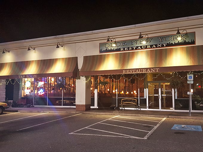 The warm glow of Olde New York beckons from the darkness like a culinary lighthouse, promising German comfort in State College's sea of college bars.