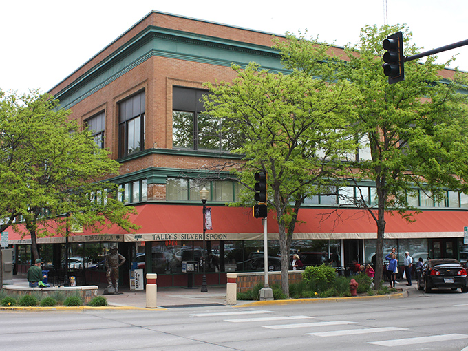 Tally's Silver Spoon stands proudly on a downtown Rapid City corner, its brick facade and red awning beckoning hungry travelers like a culinary lighthouse in a sea of tourist traps.