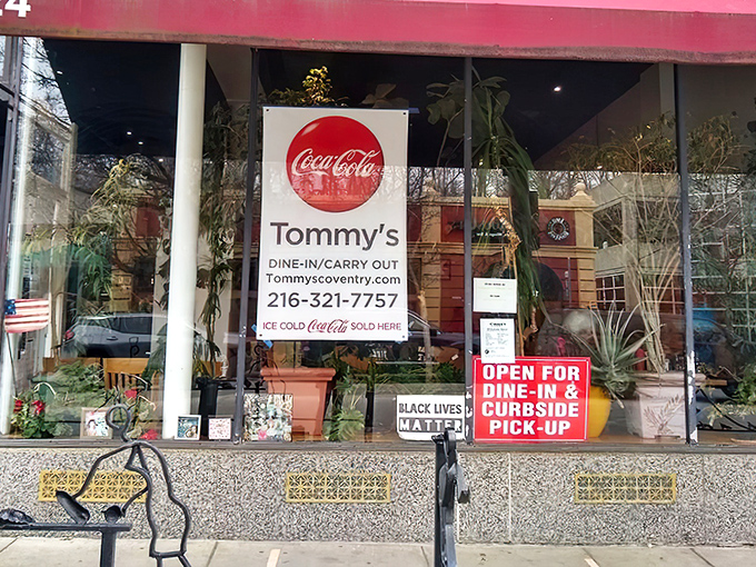 Tommy's iconic red awning beckons food lovers to this Cleveland Heights institution like a culinary lighthouse on Coventry Road.