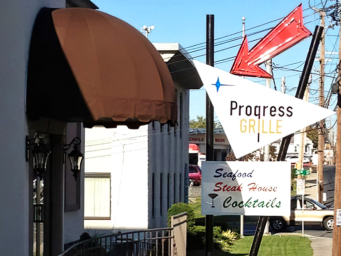 That retro arrow sign pointing you toward crab cake paradise has been guiding hungry souls for decades.