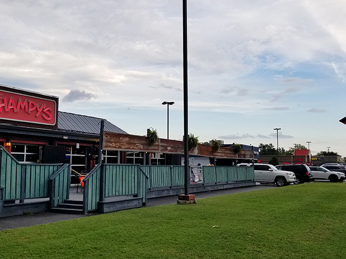 That turquoise fence isn't just decoration - it's your first hint that something special awaits inside this unassuming spot.