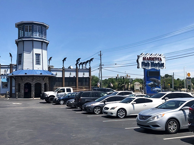 The lighthouse-topped exterior isn't just for show—it's a beacon calling seafood lovers from across Georgia to this maritime oasis in suburban Atlanta.