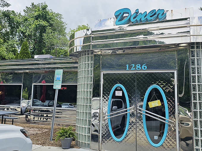 The gleaming stainless steel exterior with its signature turquoise "Diner" sign promises a time-traveling feast that your cardiologist probably wouldn't approve of.