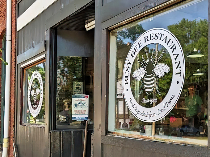 The unassuming storefront with its charming bee logo promises what every food lover seeks: honest cooking without the buzz of pretension.