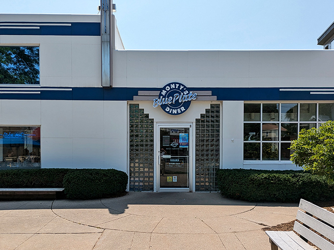 The blue-and-white facade of Monty's stands like a retro beacon on Atwood Avenue, complete with vintage Sunoco pump that whispers, "Come in, the meatloaf is waiting."