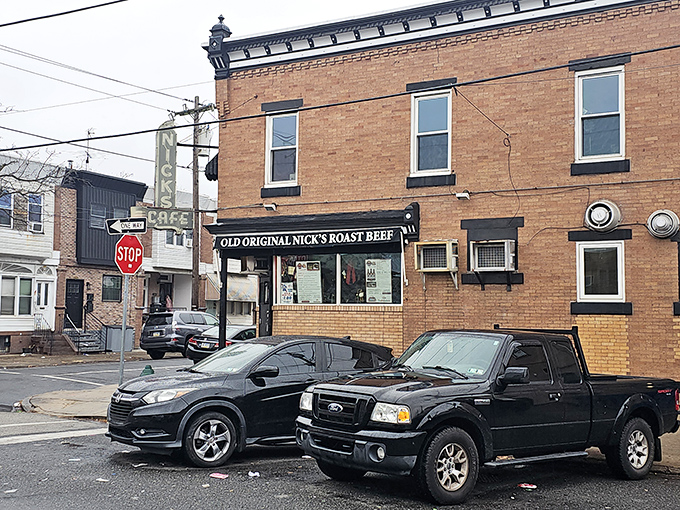 The corner brick building with its vintage neon signs isn't trying to impress anyone&mdash;it's too busy perfecting what's inside. Classic Philadelphia in architectural form.