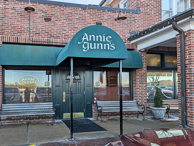 The unassuming brick exterior of Annie Gunn's hides culinary treasures like a speakeasy hides good bourbon. That iconic green awning has welcomed food lovers for generations.
