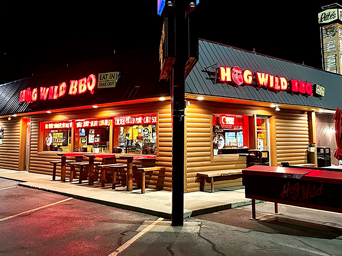 As night falls, Hog Wild transforms into a neon-lit barbecue beacon, calling to hungry travelers like a carnivorous lighthouse on Michigan's culinary coast.