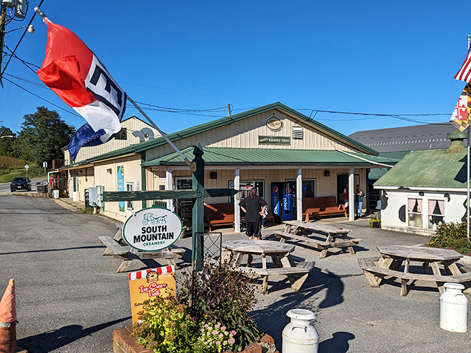 The quintessential American dairy dream – South Mountain Creamery's charming exterior beckons with picnic tables and the promise of farm-fresh delights.