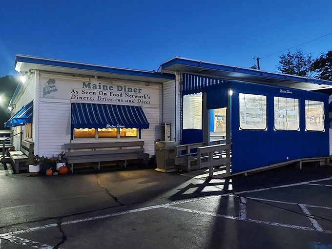 That cheerful blue awning isn't just decoration&mdash;it's a beacon calling hungry travelers to seafood paradise on Route 1.