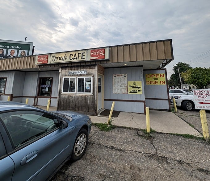 The unassuming exterior of Darcy's Cafe stands as a beacon of breakfast hope in Grand Forks, where culinary treasures often hide in plain sight.