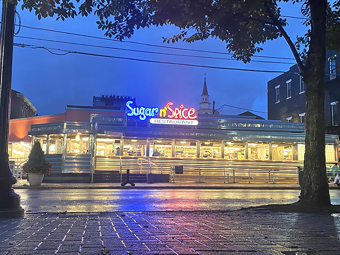 The neon glow of Sugar n' Spice at dusk is like a beacon for breakfast lovers&mdash;a pink-hued promise of fluffy omelets and morning magic awaiting inside.