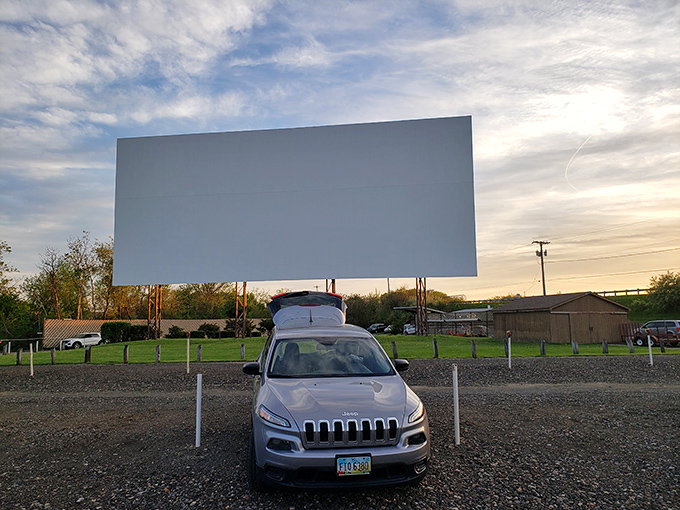The ultimate throwback entertainment experience awaits as dusk settles over the Aut-O-Rama's massive screen, where memories are made one frame at a time.