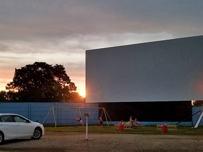 Sunset at the drive-in&mdash;nature's perfect prelude to the main feature. Those swings aren't just for kids; they're for the kid in all of us.