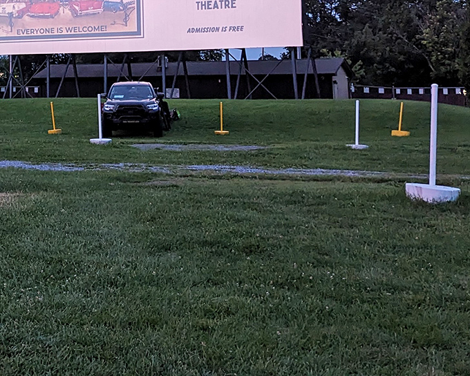 The massive white screen stands ready for twilight magic, a canvas awaiting Hollywood dreams under Pennsylvania stars.