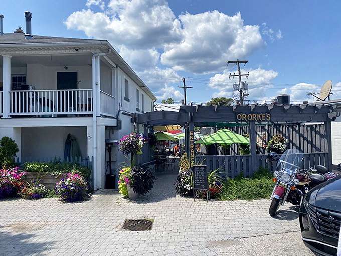 The white facade with its charming picket fence and hanging flower baskets isn't just curb appeal&mdash;it's O'Rorke's way of saying "you're home now, hungry traveler."