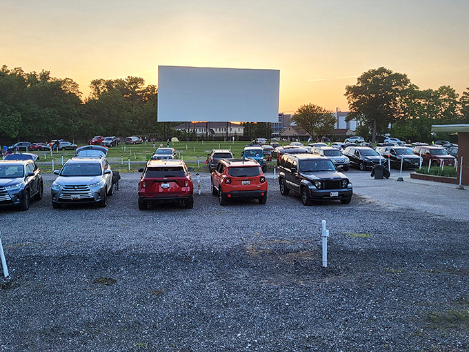 Sunset at Bengies transforms ordinary cars into time machines. The massive screen waits patiently as Maryland twilight paints the perfect backdrop for movie magic.