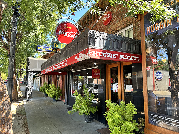 The iconic red awning and vintage Coca-Cola signs of Huggin' Molly's beckon like a time portal to simpler days in downtown Abbeville.