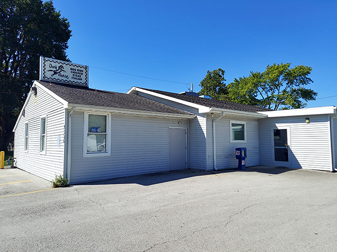 The simple white siding and understated signage serve as culinary camouflage, hiding the gastronomic treasures waiting inside this Findlay favorite.