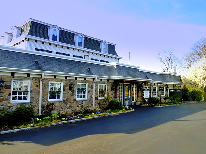 The historic fieldstone exterior of Spring House Tavern welcomes meat lovers to Ambler's prime rib paradise, a destination worth every mile driven.