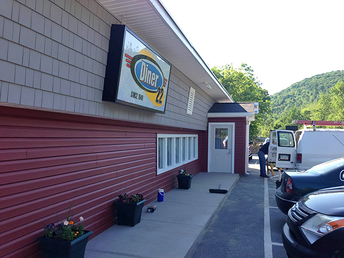 The unassuming red exterior of Diner 22 proves once again that the best food experiences often hide in plain sight along Pennsylvania's scenic byways.