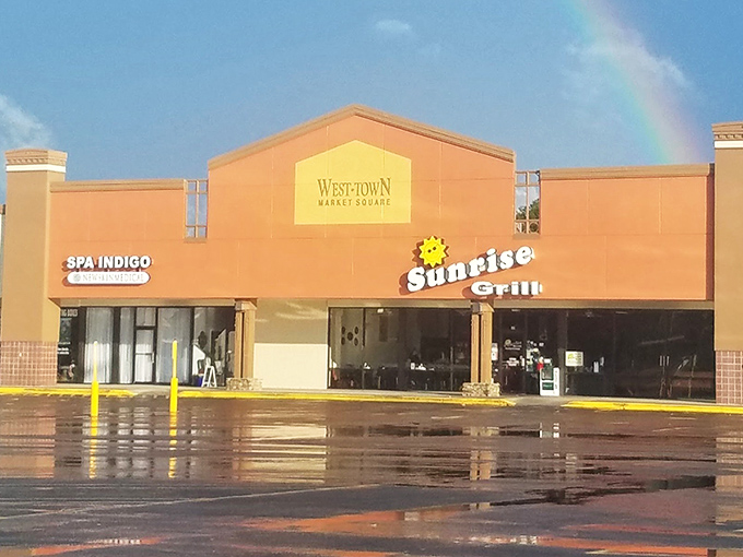 A rainbow arches over Sunrise Grill in Westtown Market Square &ndash; nature's own endorsement of Augusta's beloved breakfast haven.