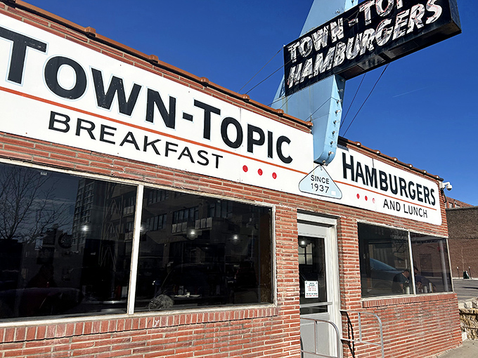 That iconic sign beckons burger lovers to Kansas City's timeless diner, where culinary magic happens around the clock.
