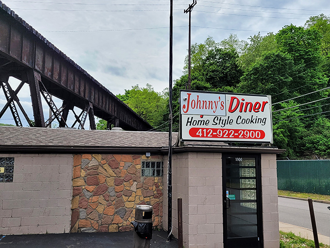 Nestled beneath a rusting railroad trestle, Johnny's Diner looks like it was built on a dare&mdash;and thank goodness for that dare.