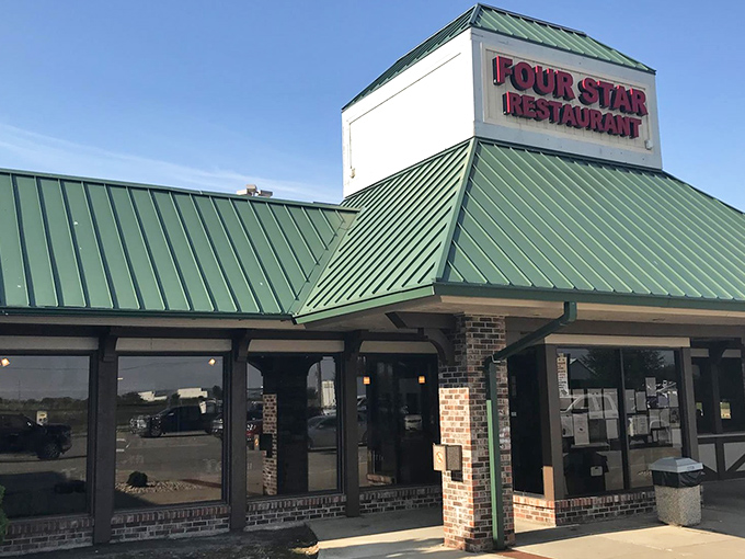 The green-roofed beacon of comfort food stands proudly along Route 251, promising the kind of meal that makes detours worthwhile.