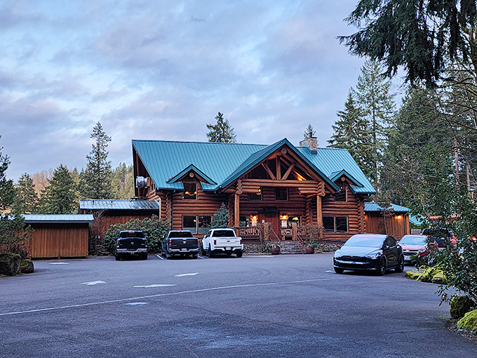 The majestic log cabin exterior of Stone Cliff Inn emerges from the forest like a culinary Narnia, promising adventures for your taste buds.