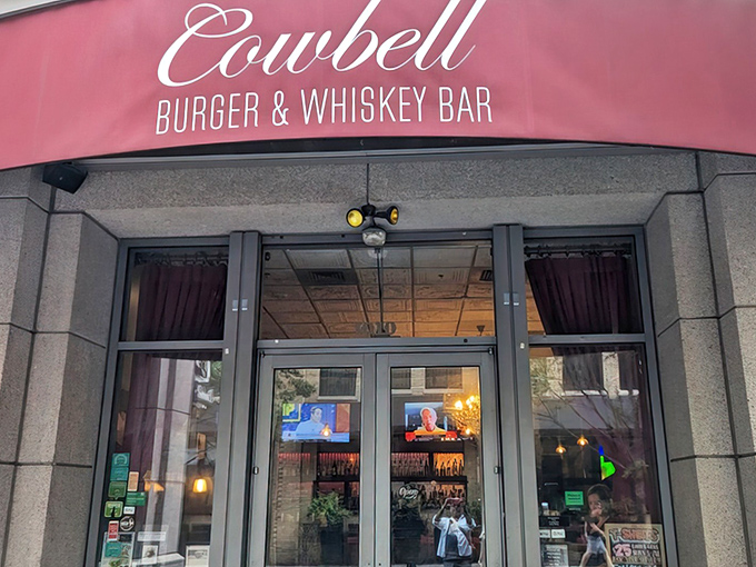The iconic red awning of Cowbell beckons like a culinary lighthouse in Charlotte's uptown. One glance and you know serious burger business awaits inside.