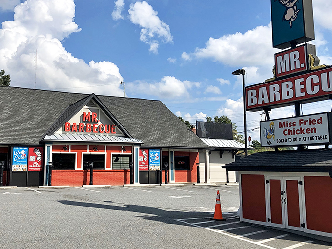 The black-roofed sanctuary of smoke and sauce stands proudly on Peters Creek Parkway, a beacon for barbecue pilgrims seeking salvation from mediocre meals.